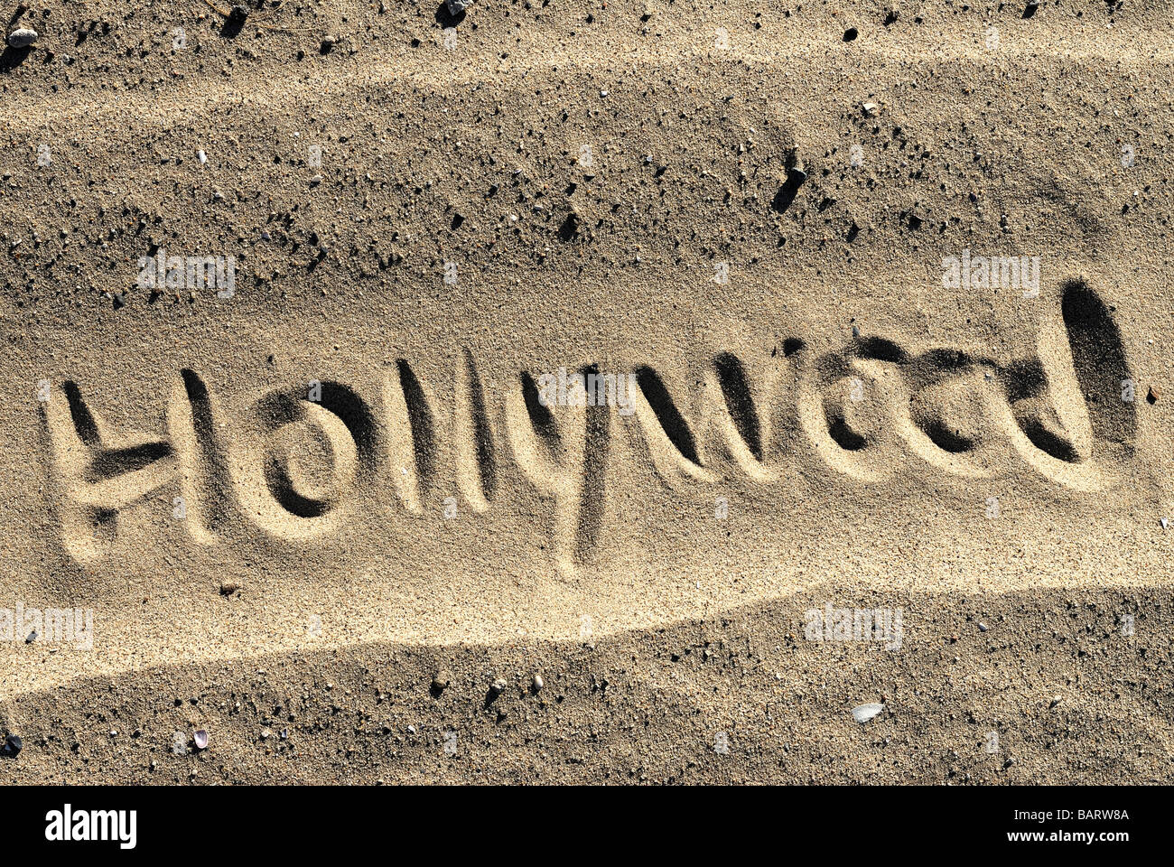 hollywood write on sand Stock Photo - Alamy