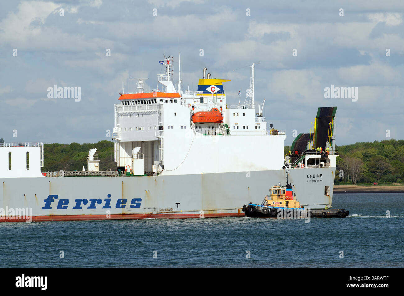 RoRo freighter ship Undine underway on Southampton Water with tug ...