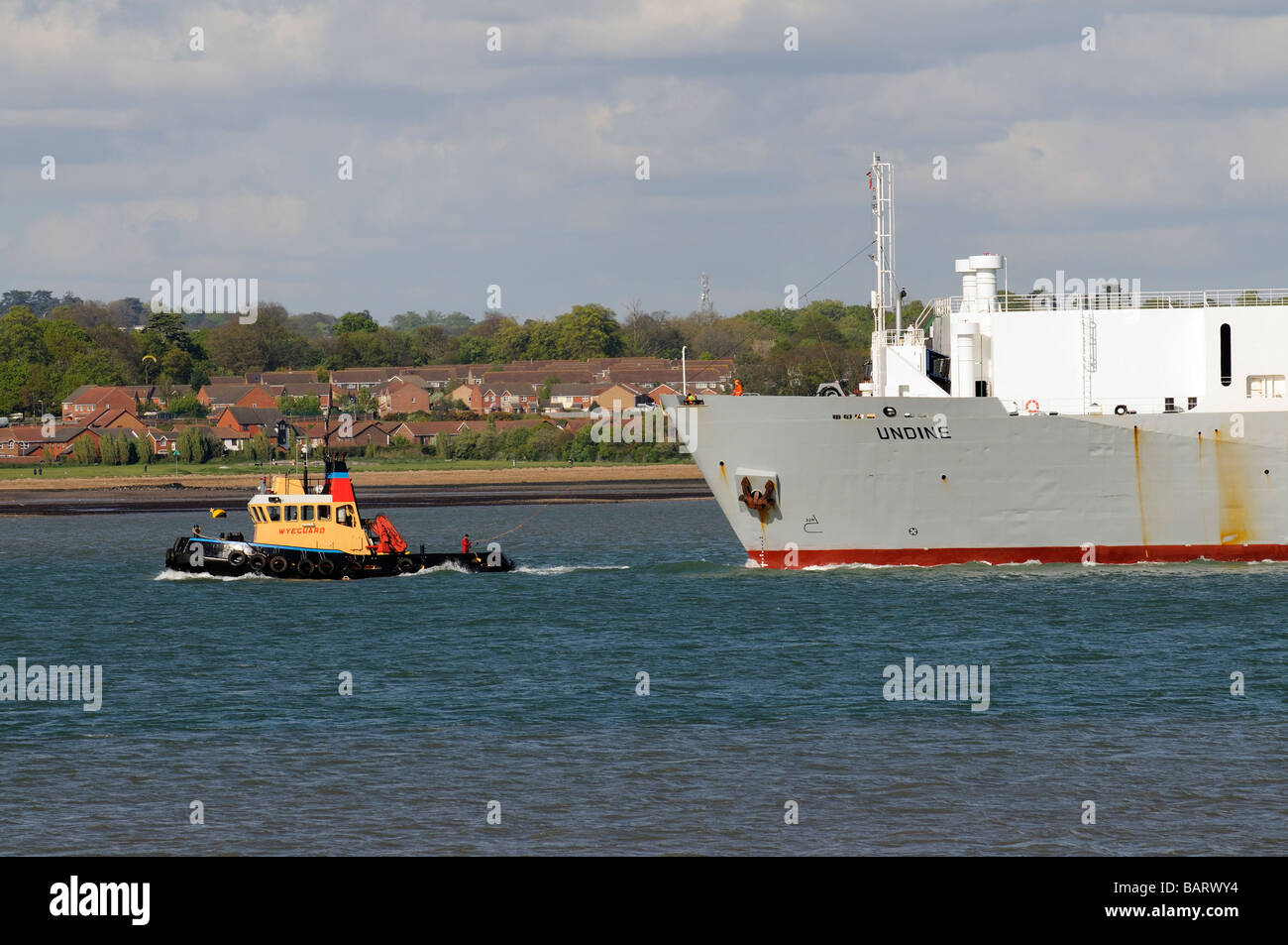 RoRo freighter ship Undine underway on Southampton Water with tug ...