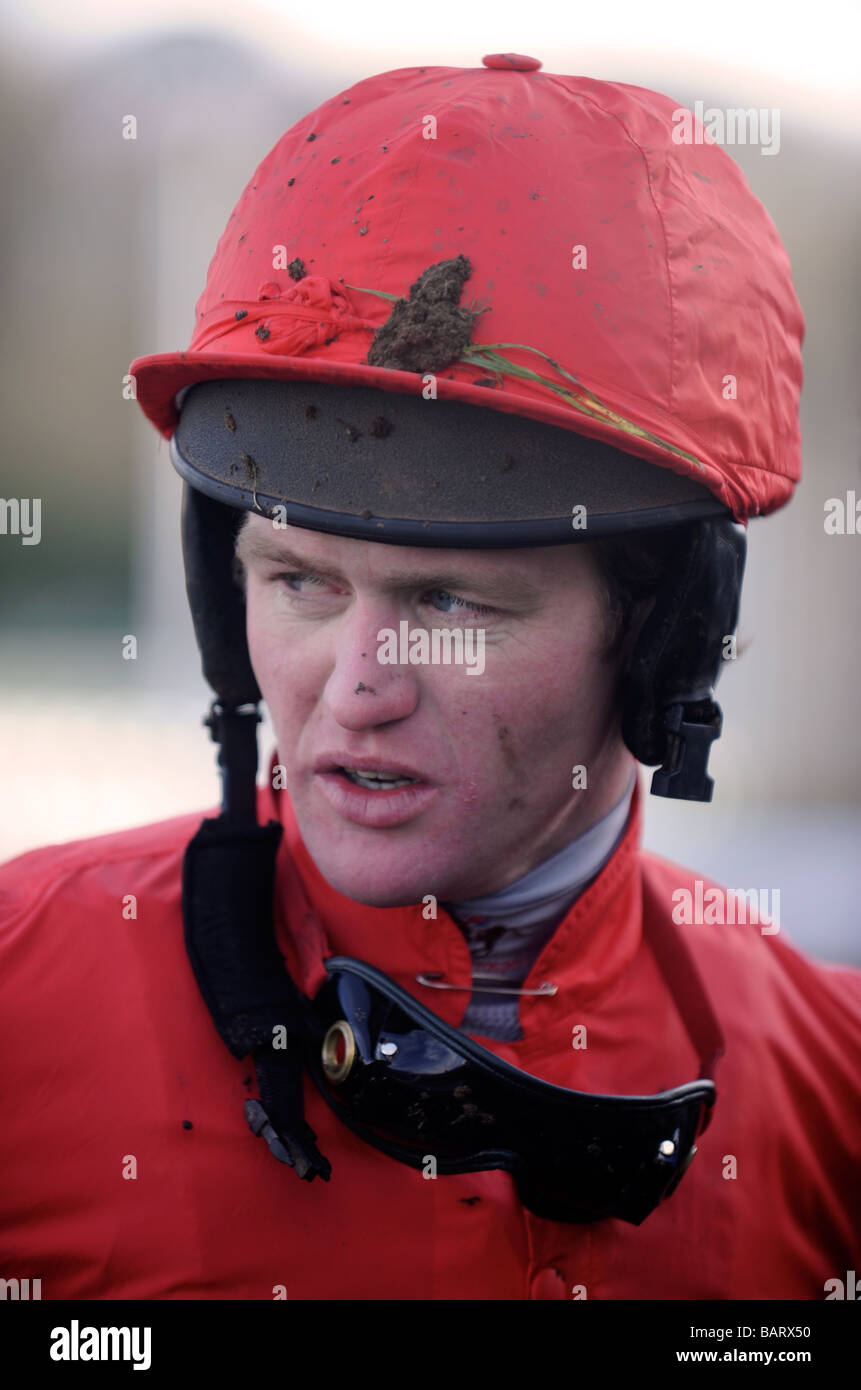 The jockey Joe Tizzard returns to the unsaddling enclosure at Chepstow ...