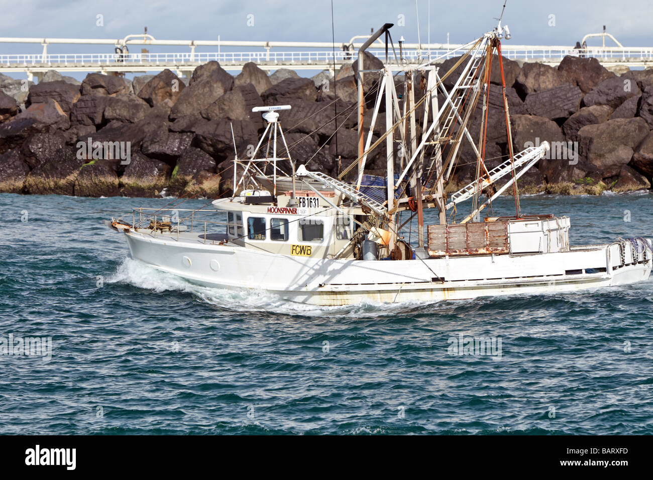 Trawler putting to sea Stock Photo - Alamy