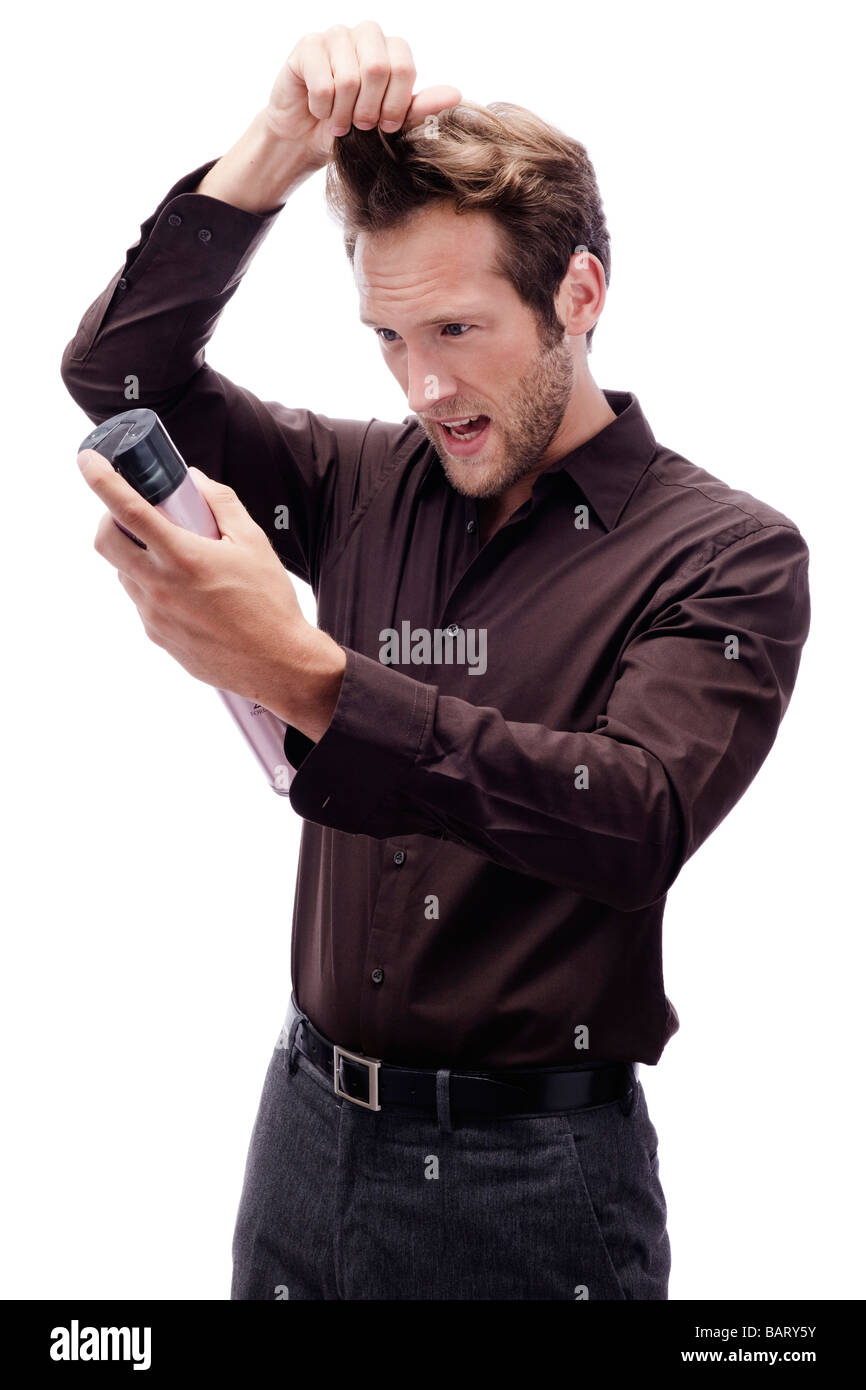 Young man using mouth spray hi-res stock photography and images - Alamy