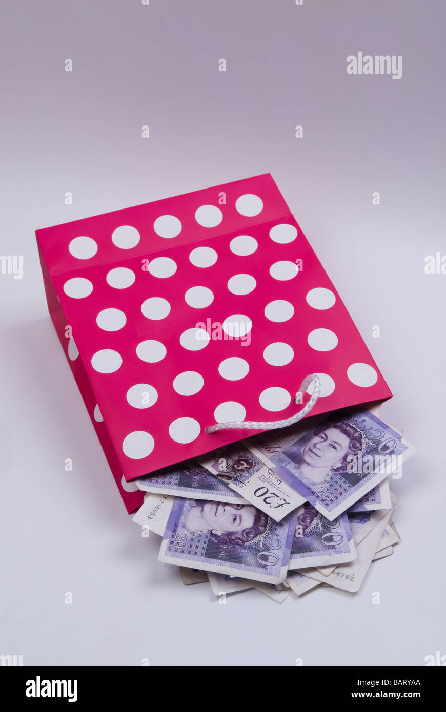 British money inside a shopping bag Stock Photo - Alamy