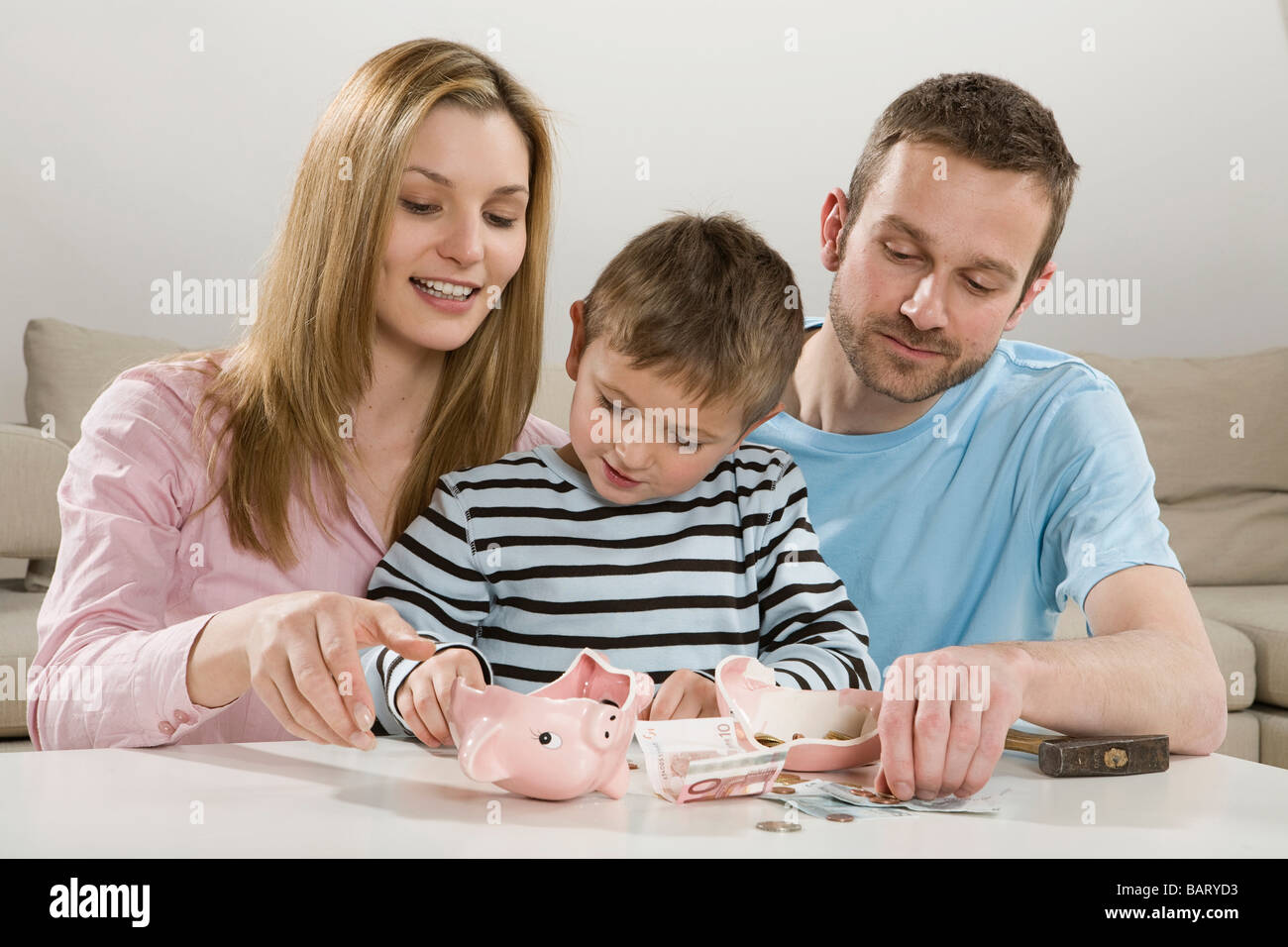 Father and son counting money hi-res stock photography and images - Alamy