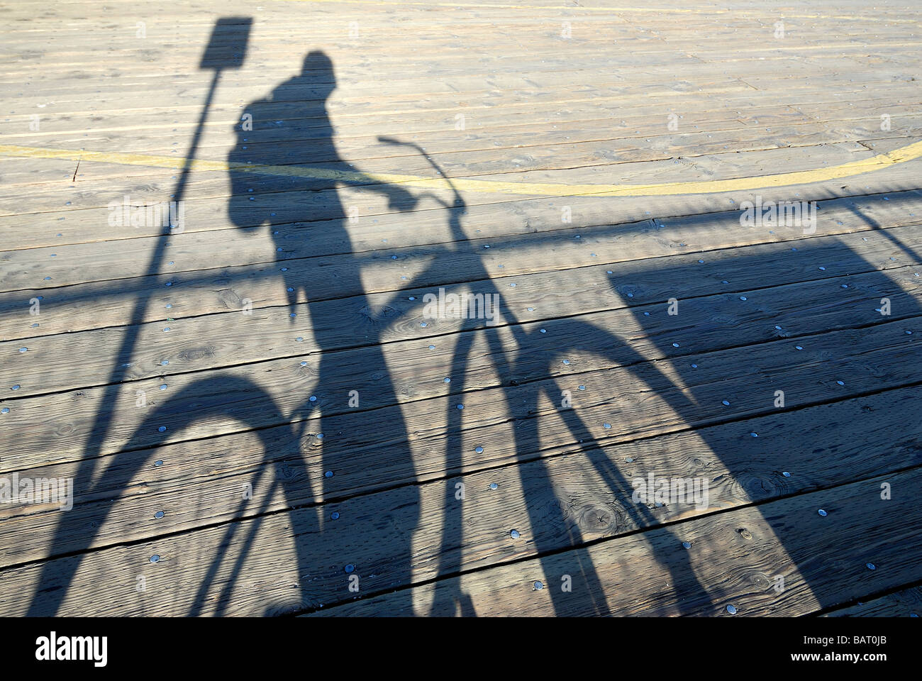 Shadow of bike hi-res stock photography and images - Alamy