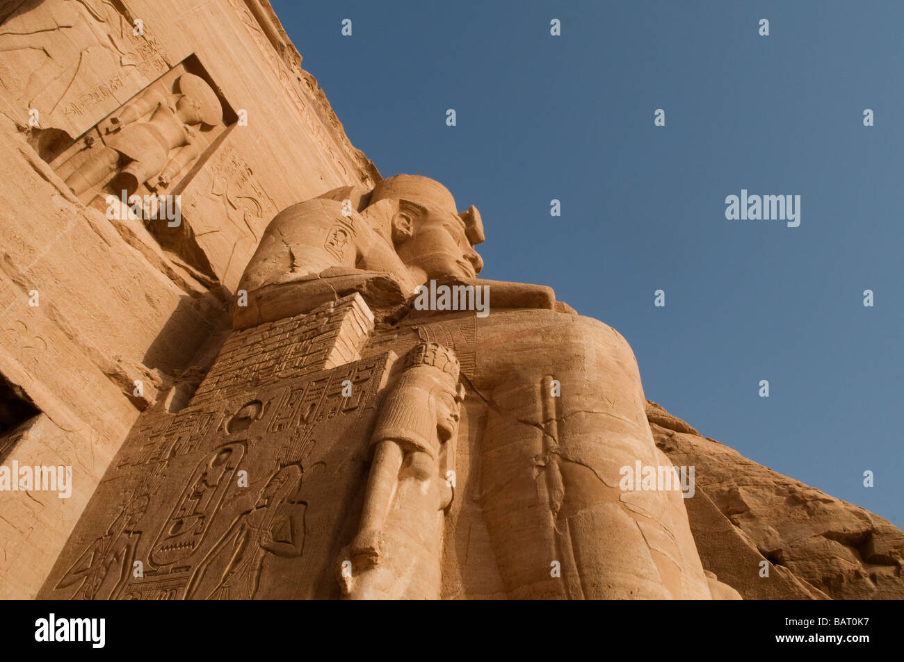 The massive four colossal statues of Pharaoh decorating entrance to the ...