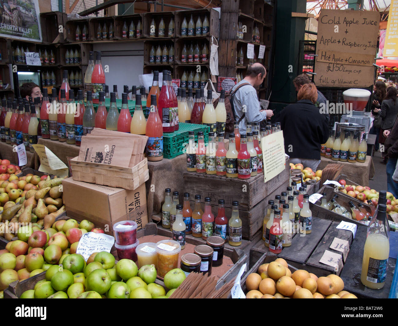 Aple juice and fruit stall Borough market London Stock Photo - Alamy