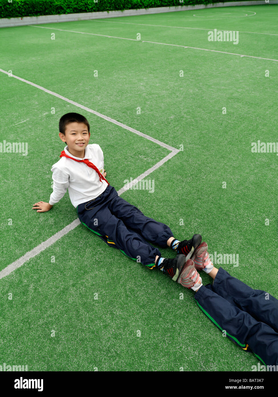 School children stretching during a physical fitness class Stock Photo ...
