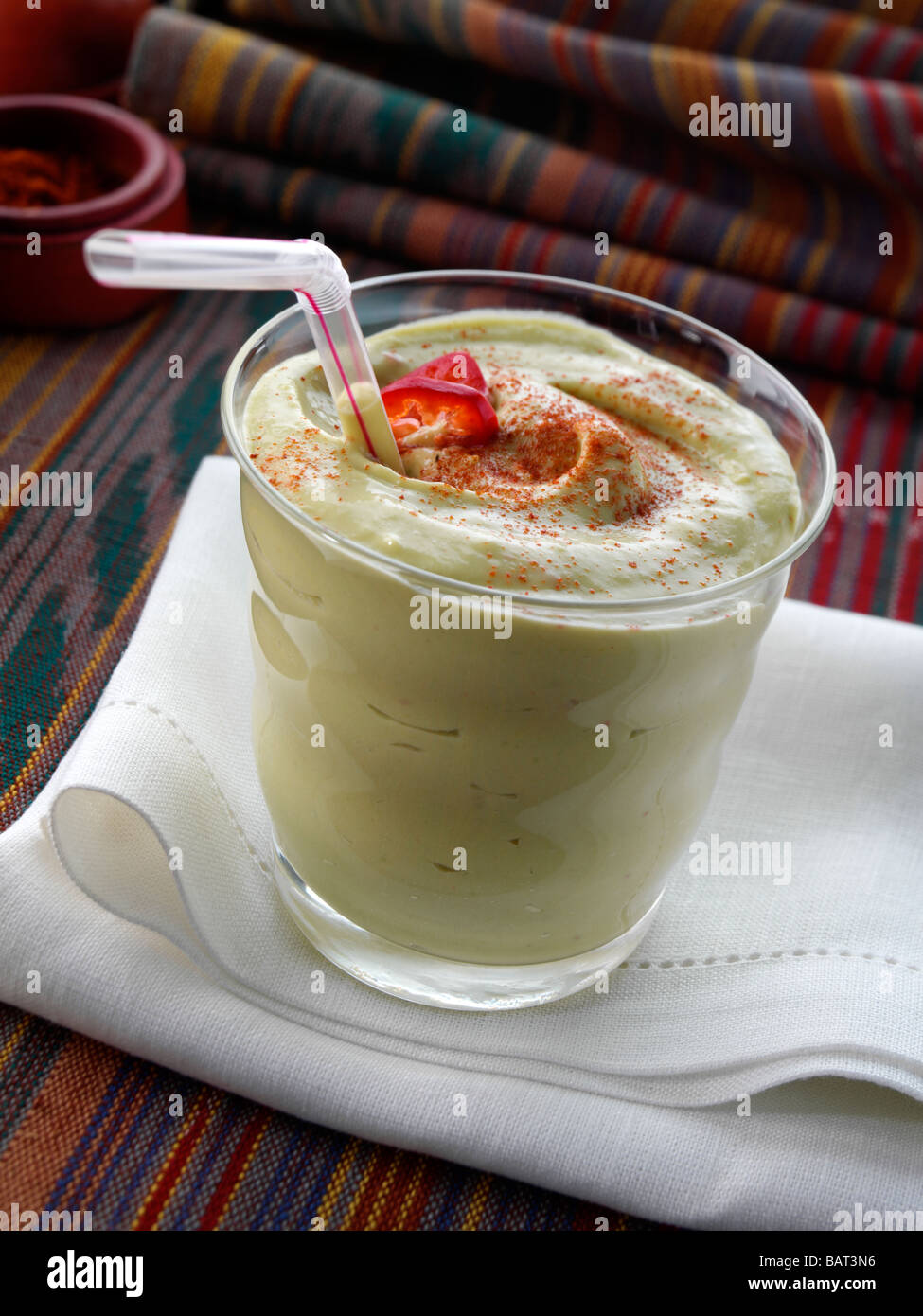 A glass of avocado spice smoothie Stock Photo - Alamy
