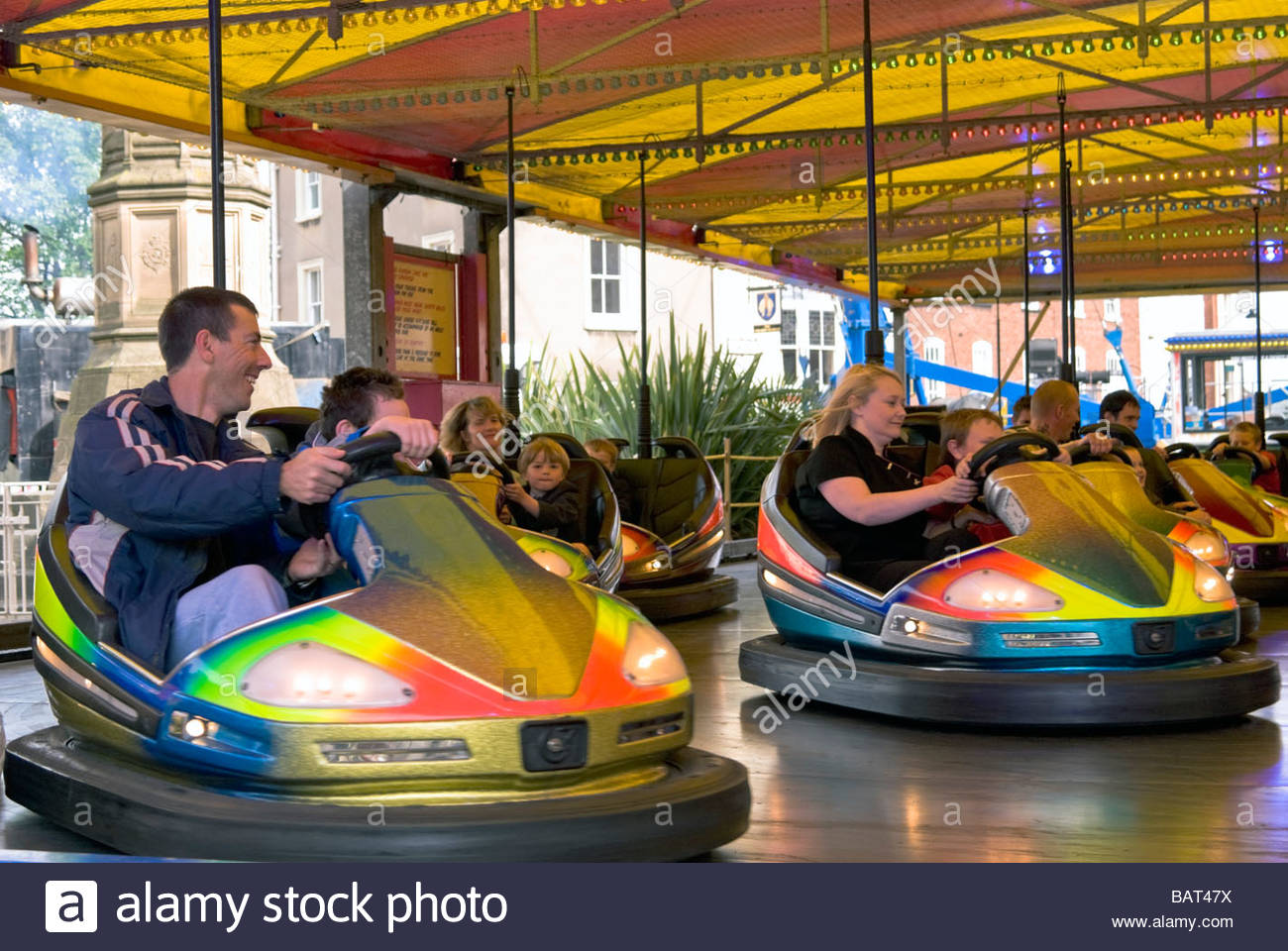 People having fun on the Dodgems fairground ride at Hereford Mayfair ...