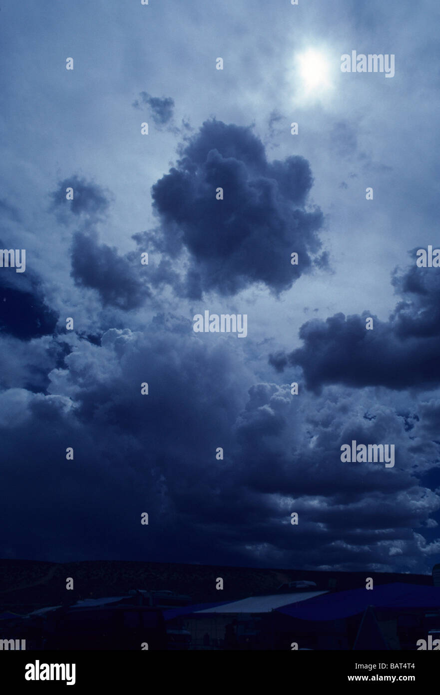 Sun blue sky cloud storm glow threat weather blow rain danger Stock ...