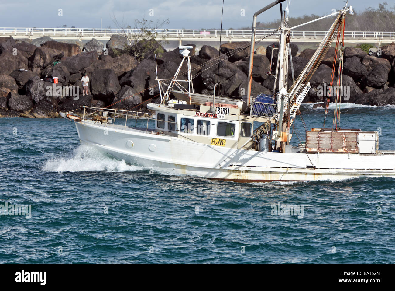 Trawler putting to sea Stock Photo - Alamy