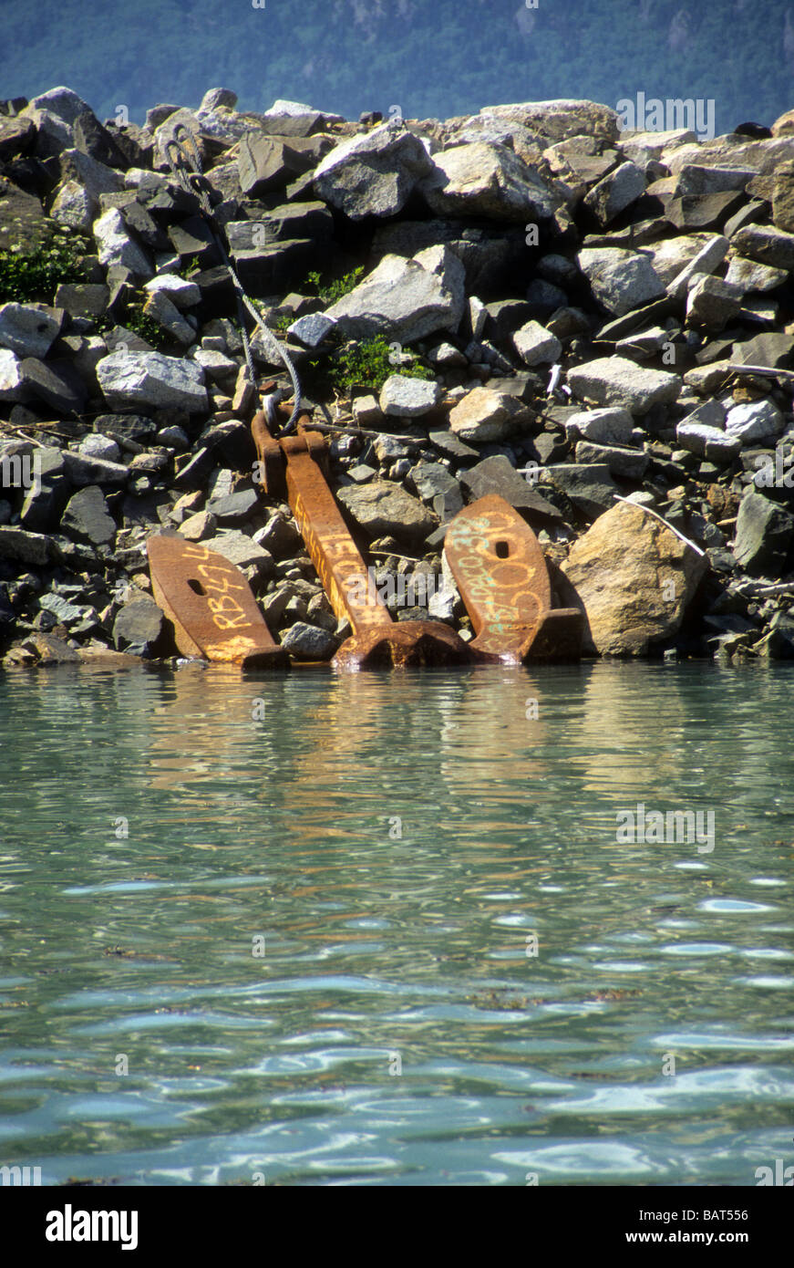 Rust anchor rock weather metal heavy worn sea water rock Stock Photo ...