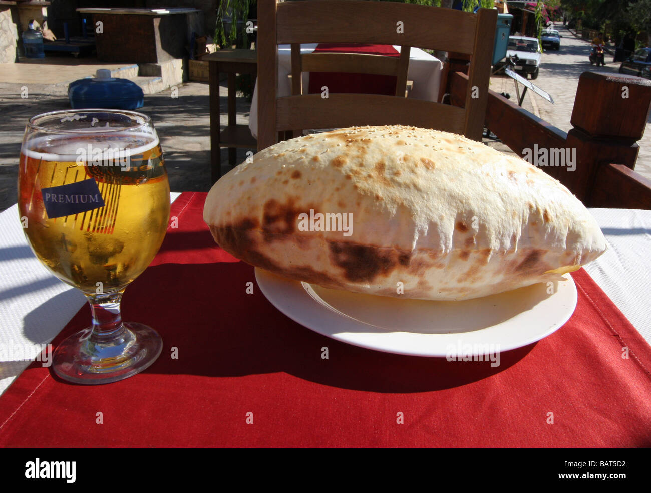 Traditional Turkish pitta bread served with a beer Stock Photo - Alamy