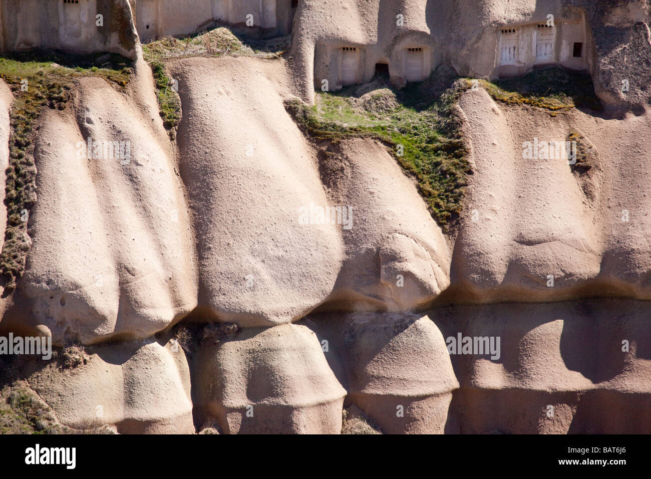 Rock formations and carved homes in Cappadocia Turkey Stock Photo - Alamy