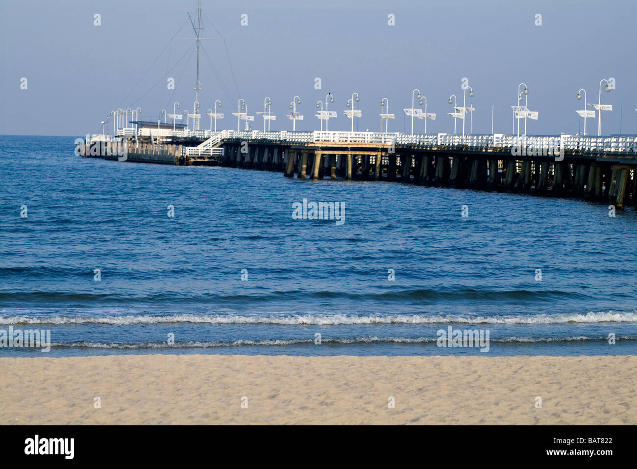 Dock at beach Stock Photo - Alamy
