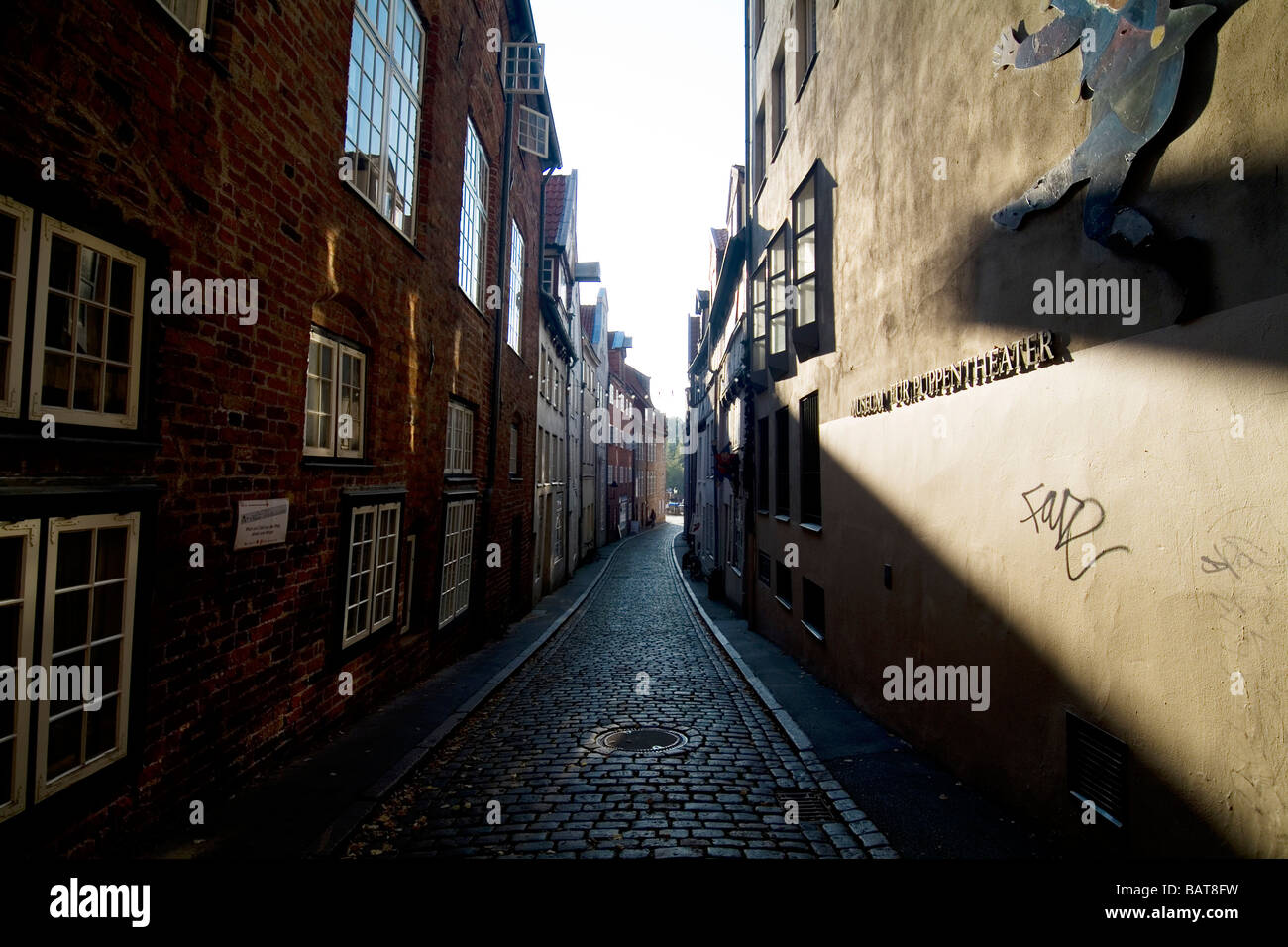 Alley between buildings Stock Photo - Alamy