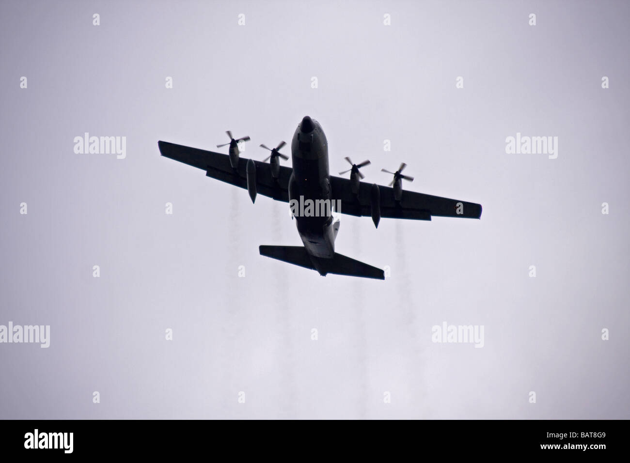 Transport military plane Hercules in flight Stock Photo - Alamy