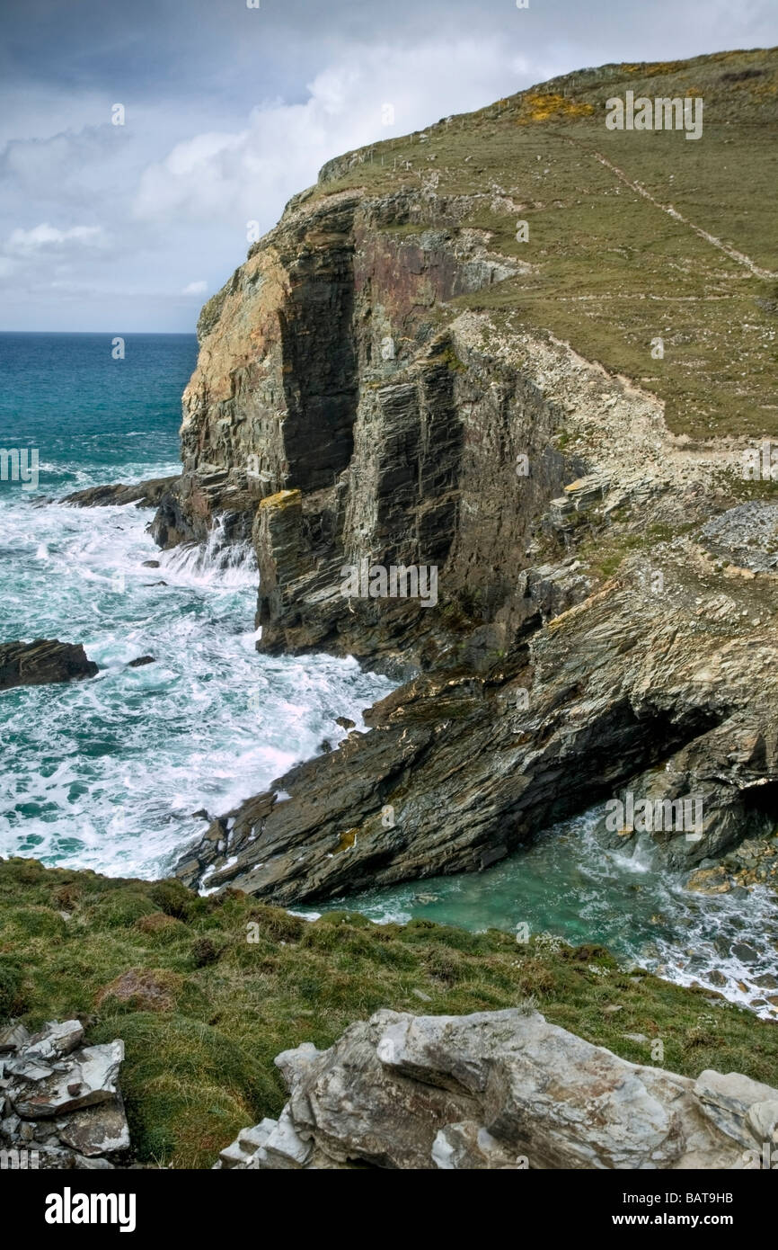 Slopping cliff side at Backways Cove Stock Photo - Alamy