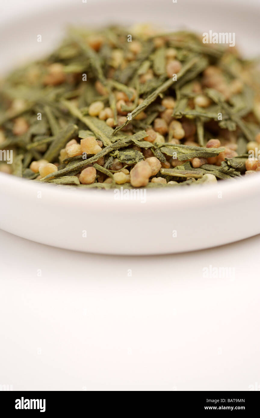 Still life with Green tea steams and toasted rice Stock Photo - Alamy