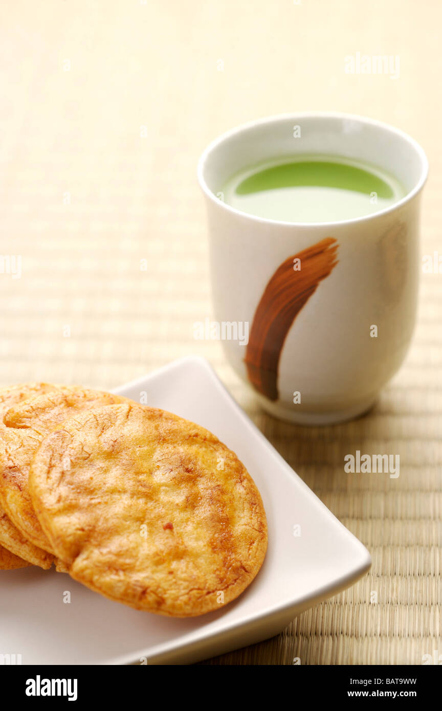 Japanese Rice Crackers and Green Tea Stock Photo - Alamy