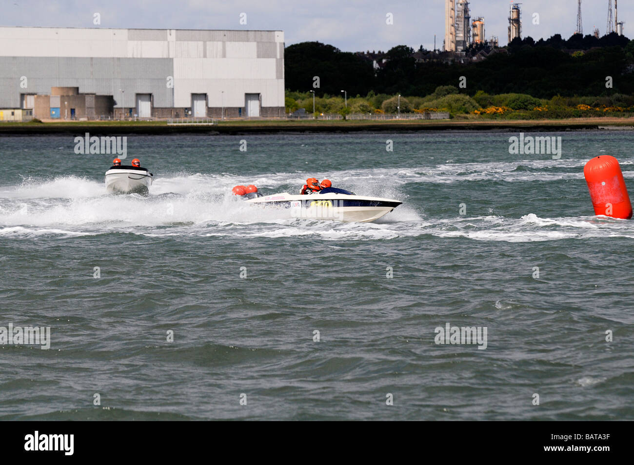 Fletcher speed boats racing off Calshot Spit Hampshire Stock Photo - Alamy