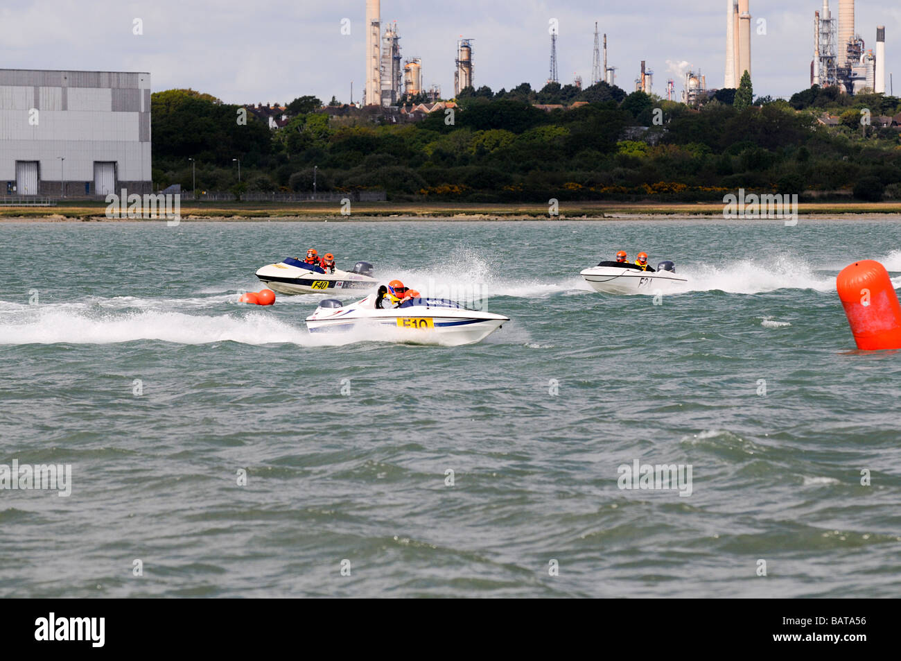 Fletcher speed boats racing off Calshot Spit Hampshire Stock Photo - Alamy