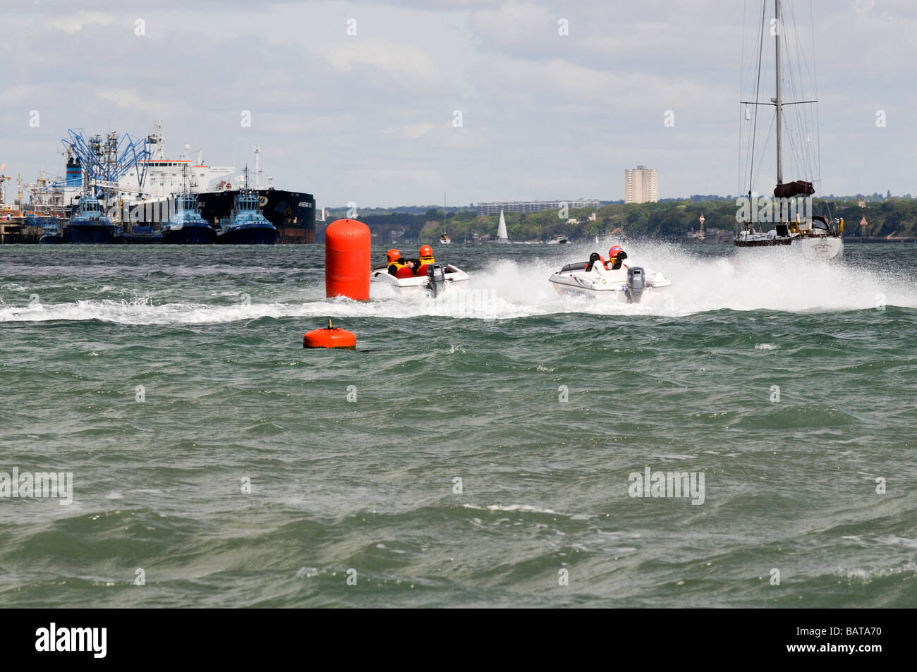 Fletcher speed boats racing off Calshot Spit Hampshire Stock Photo - Alamy