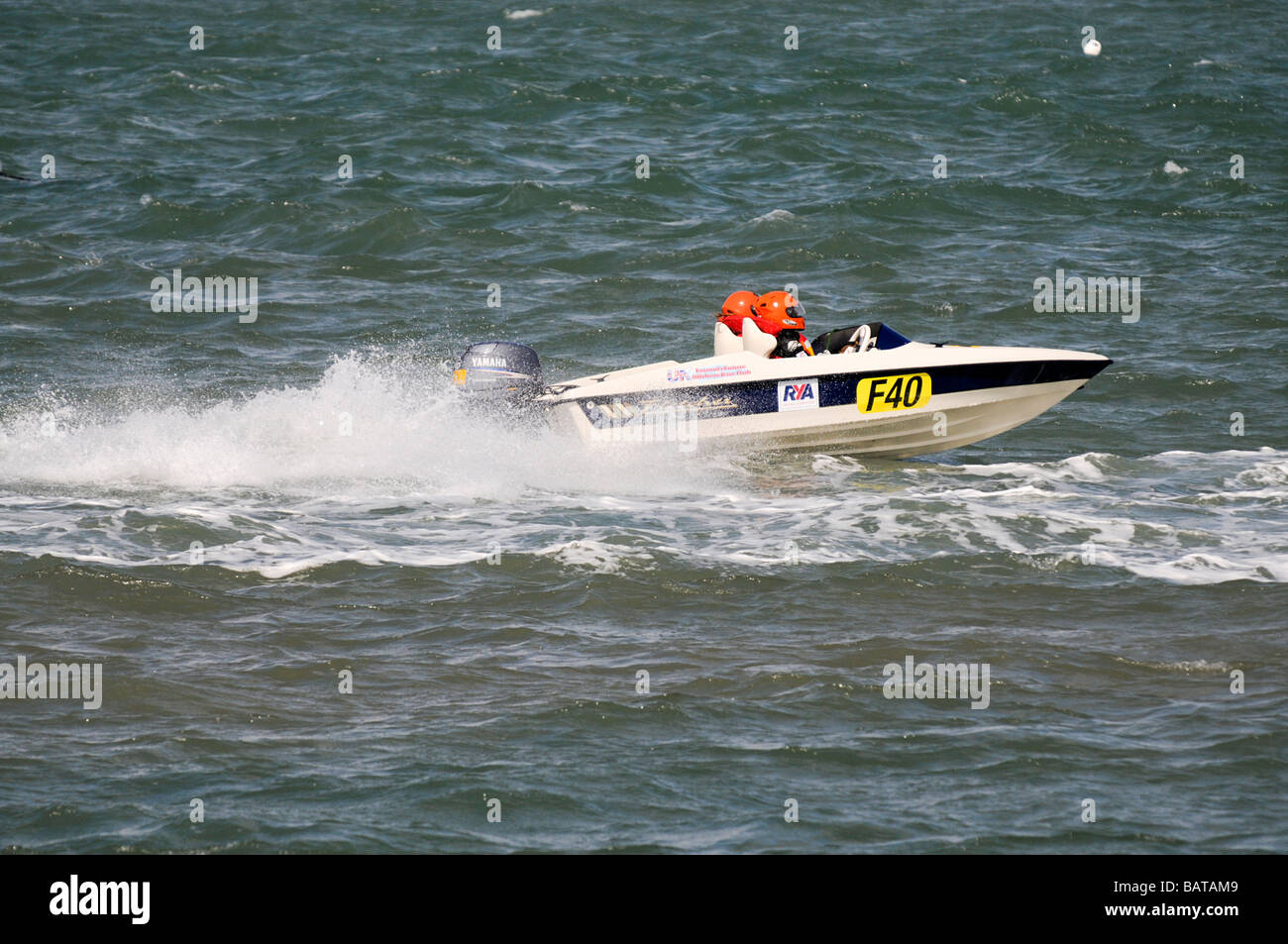 Fletcher speed boats racing off Calshot Spit Hampshire Stock Photo - Alamy