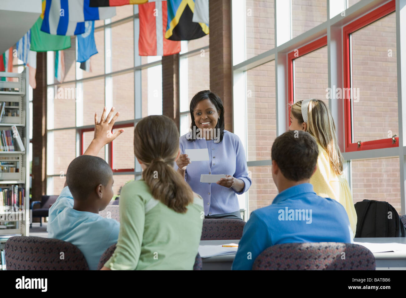 Teacher asking students questions Stock Photo - Alamy