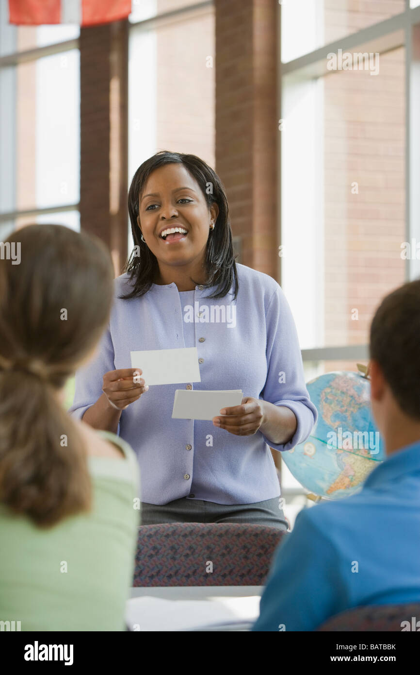 Teacher asking students questions Stock Photo - Alamy