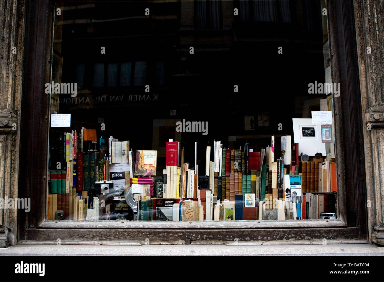 The window and shop front of an old book store - Brussels, Belgium ...