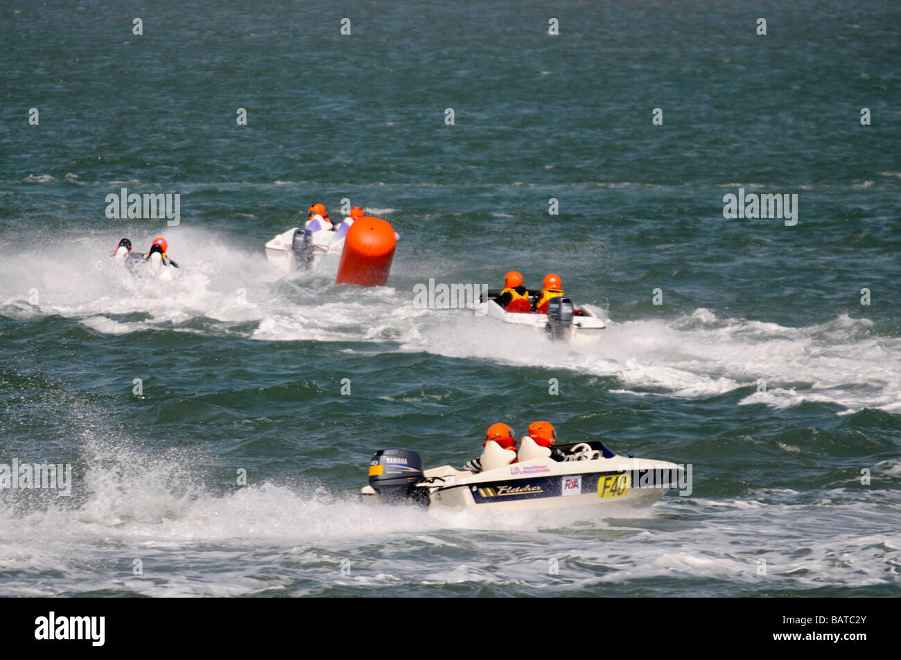 Fletcher speed boats racing off Calshot Spit Hampshire Stock Photo - Alamy