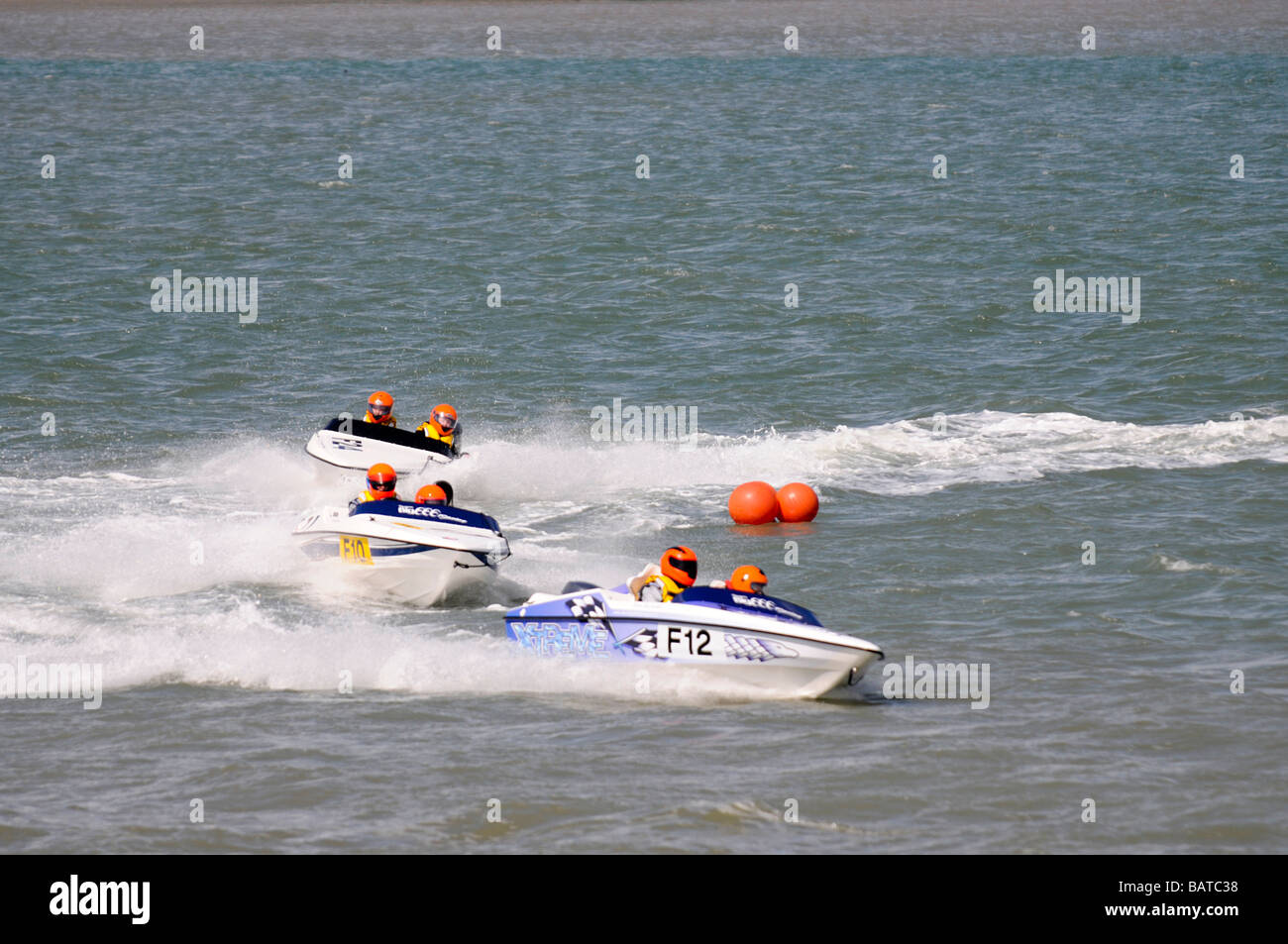 Fletcher speed boats racing off Calshot Spit Hampshire Stock Photo - Alamy