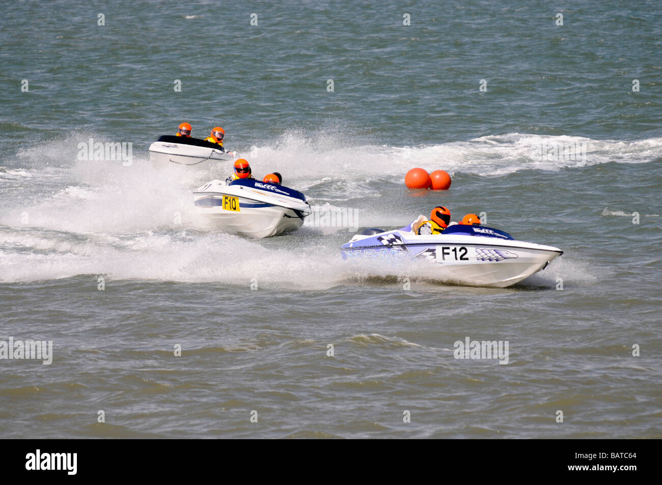 Fletcher speed boats racing off Calshot Spit Hampshire Stock Photo - Alamy