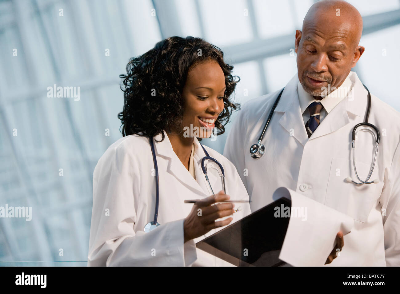 African Doctors Looking At Chart High Resolution Stock Photography and ...