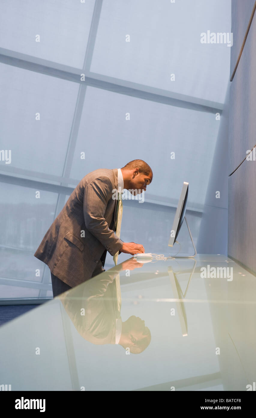 African businessman using computer Stock Photo - Alamy