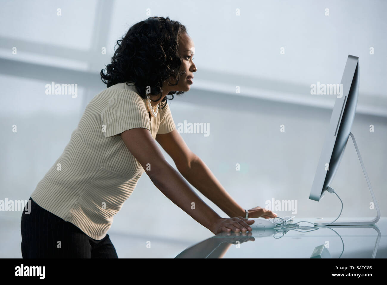 African businesswoman using computer Stock Photo - Alamy