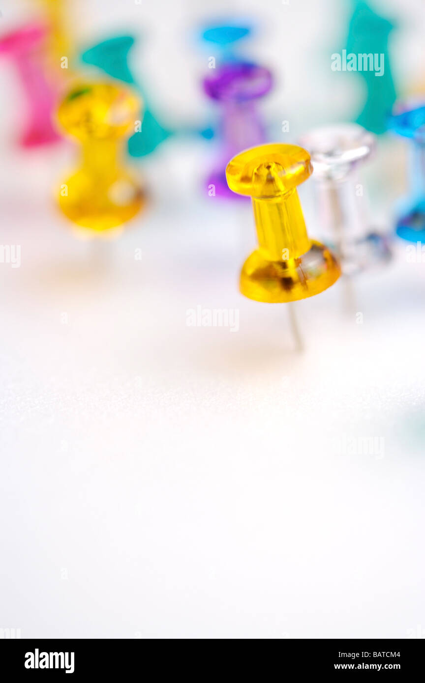 Transparent thumbtacks close up Stock Photo - Alamy