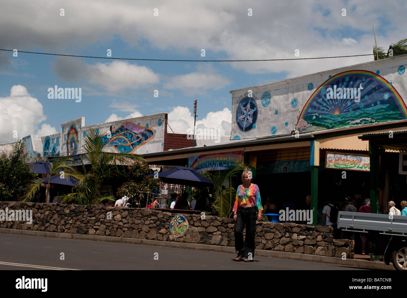 Woman crossing the road Main street Nimbin NSW Australia Stock Photo ...