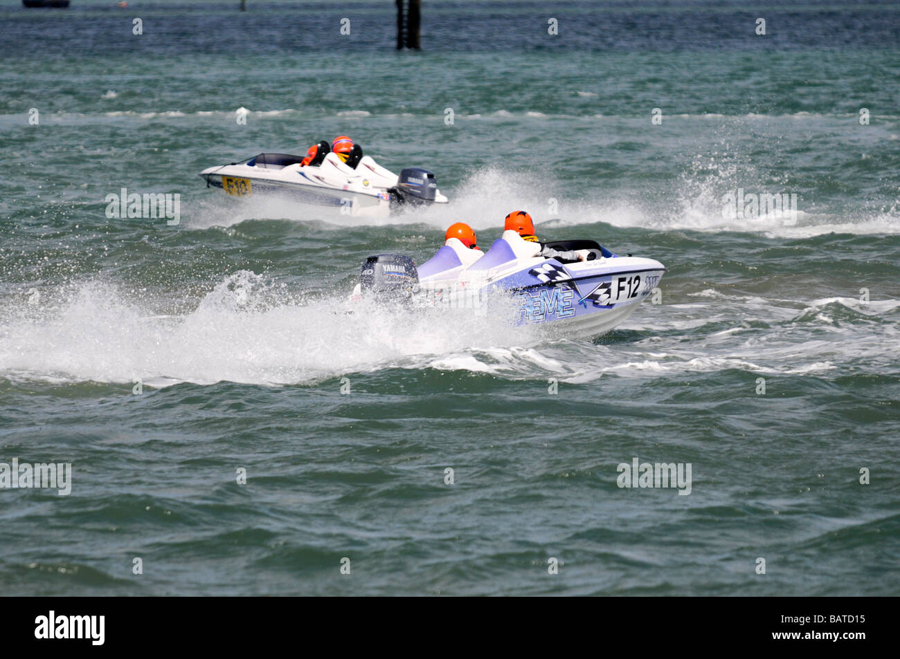 Fletcher speed boats racing off Calshot Spit Hampshire Stock Photo - Alamy