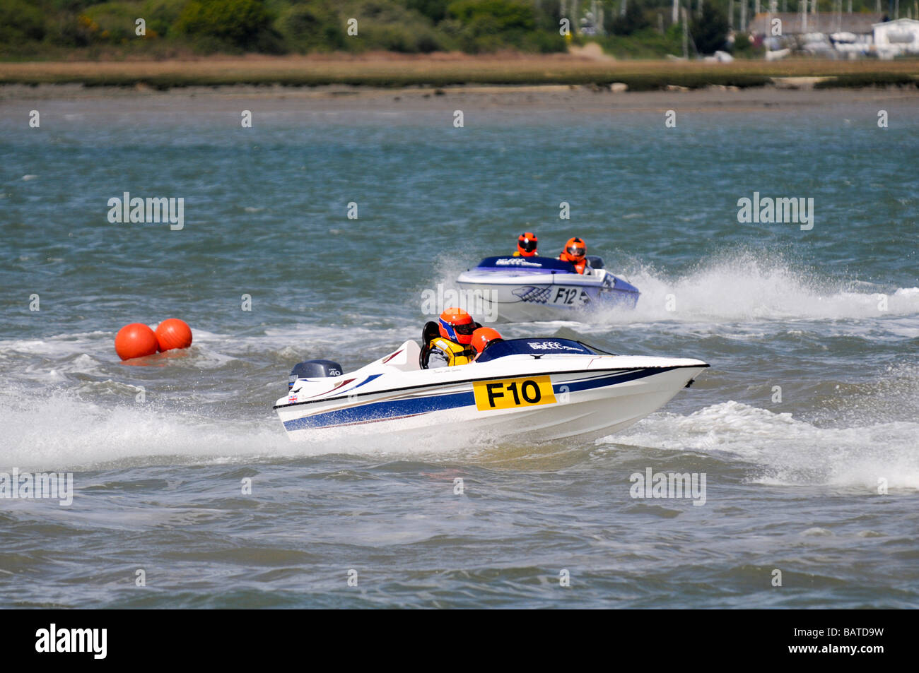 Fletcher speed boats racing off Calshot Spit Hampshire Stock Photo - Alamy