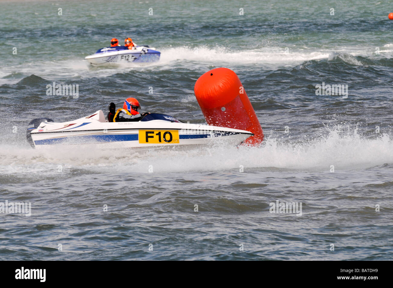 Fletcher speed boats racing off Calshot Spit Hampshire Stock Photo - Alamy