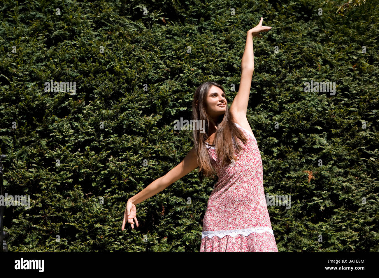 young woman dancing in the garden Stock Photo - Alamy