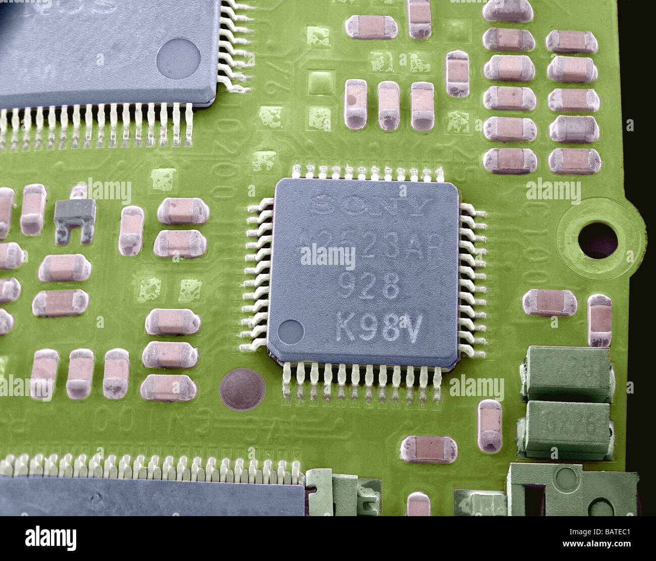 Circuit board microchip, coloured scanningelectron micrograph (SEM ... Circuit board microchip, coloured scanningelectron micrograph (SEM ...
