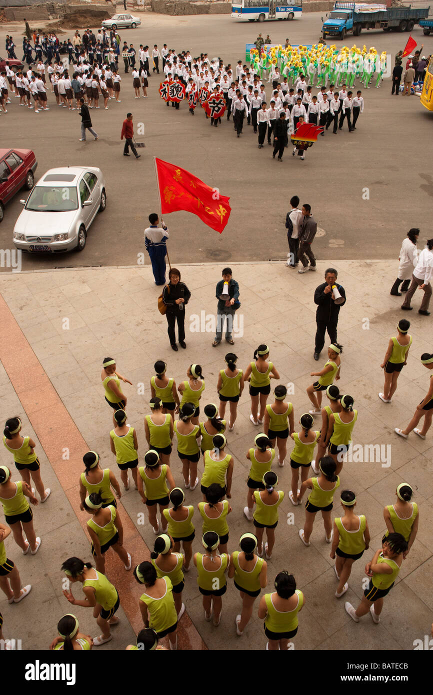 School children arriving at the city sports stadium to rehearse for a ...