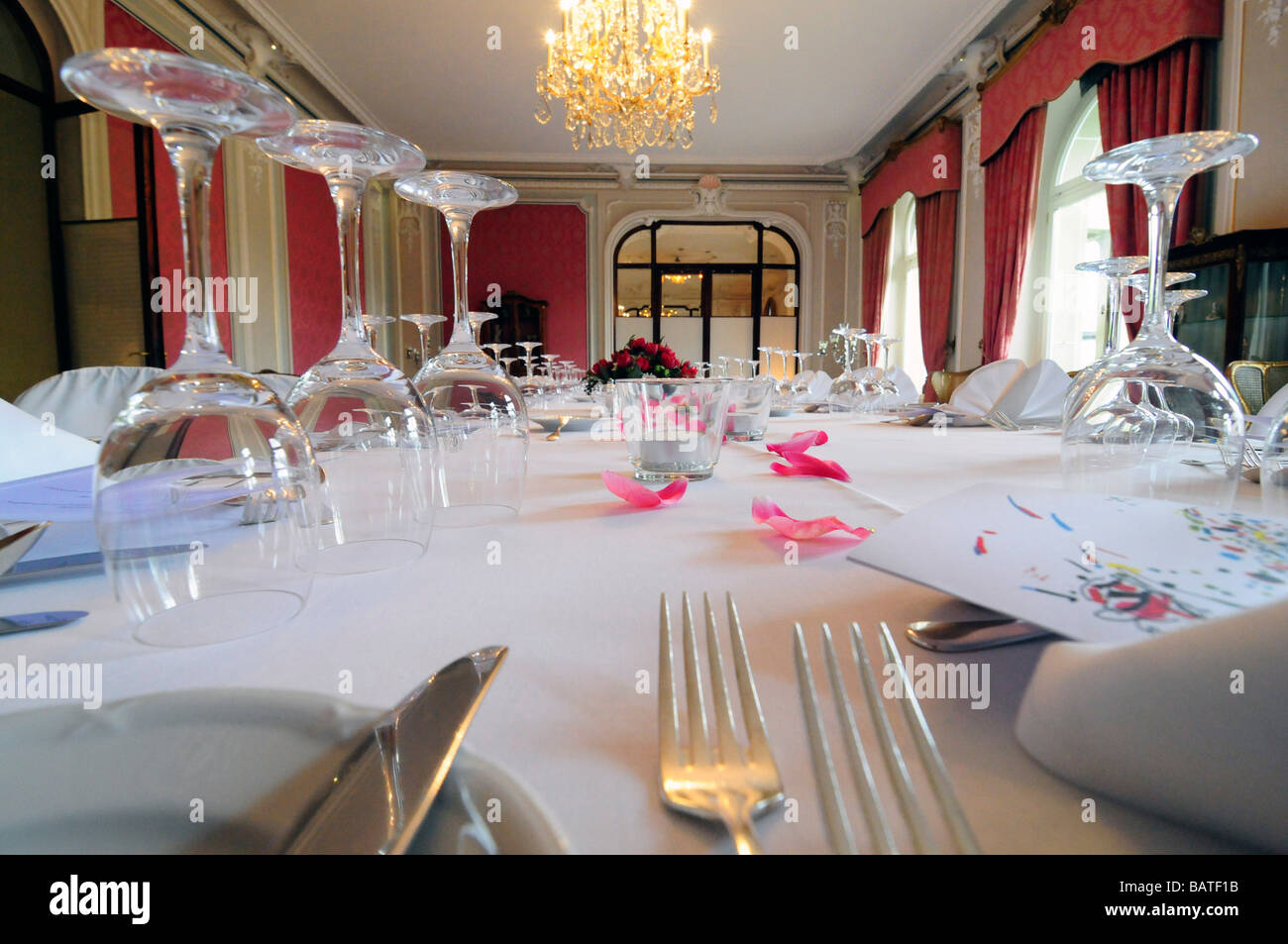 A table prepared for a large banquet in a luxury hotel in Switzerland ...