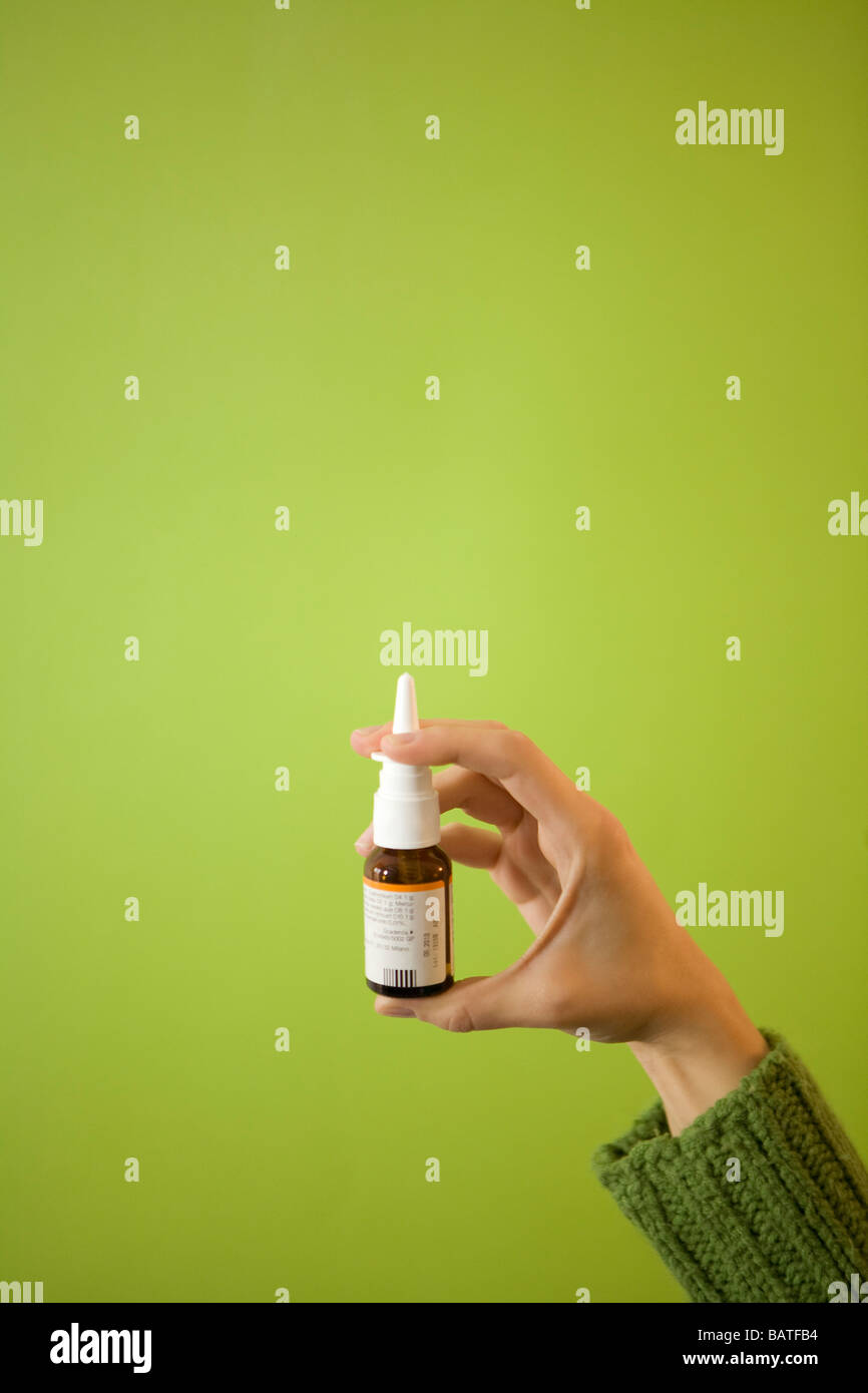 hand with spray Stock Photo - Alamy