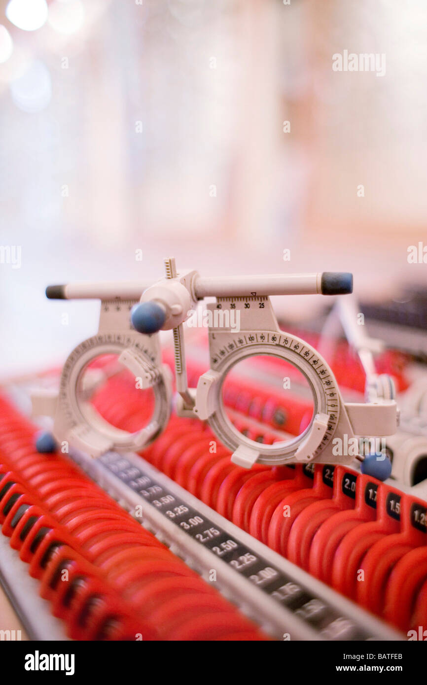 Trial frame and lenses. A trial frame is used byan optician, who ...