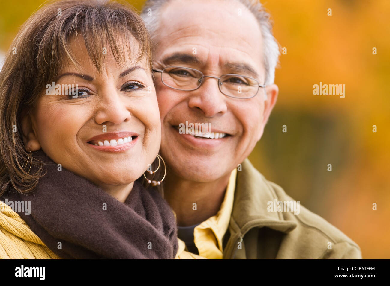 Hispanic couple smiling Stock Photo - Alamy